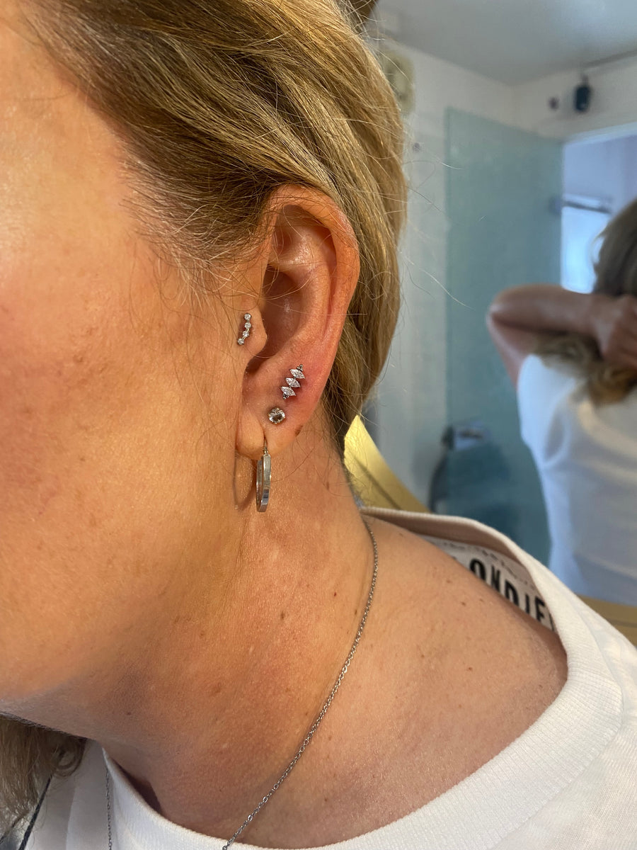 Tragus and higher lobe – Bodylink piercing studio Maidstone.