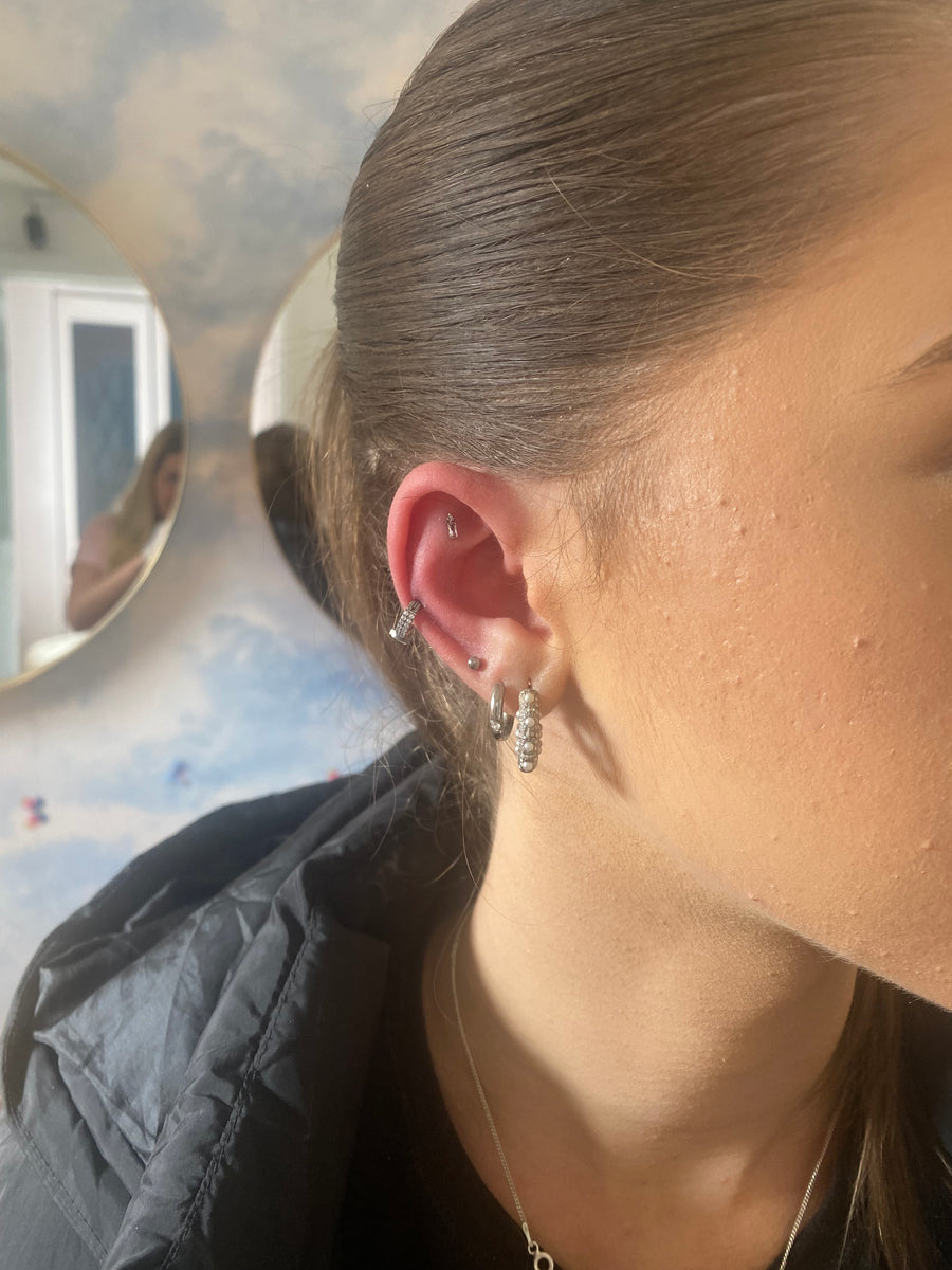 Flat piercing – Bodylink piercing studio Maidstone.
